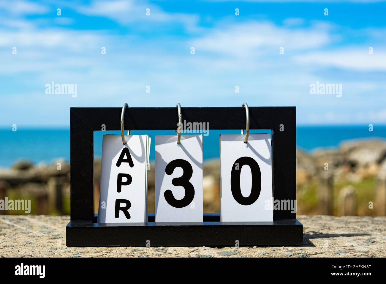 Apr 30 calendar date text on wooden frame with blurred background of ...