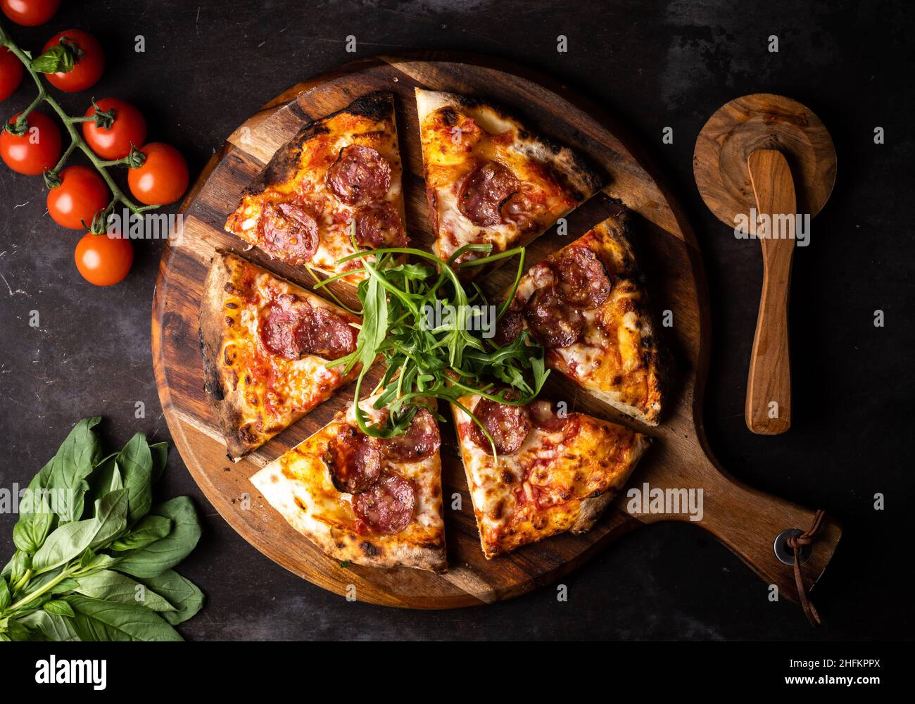 Wood fired stone baked pizza with chorizo and salad hi-res stock ...