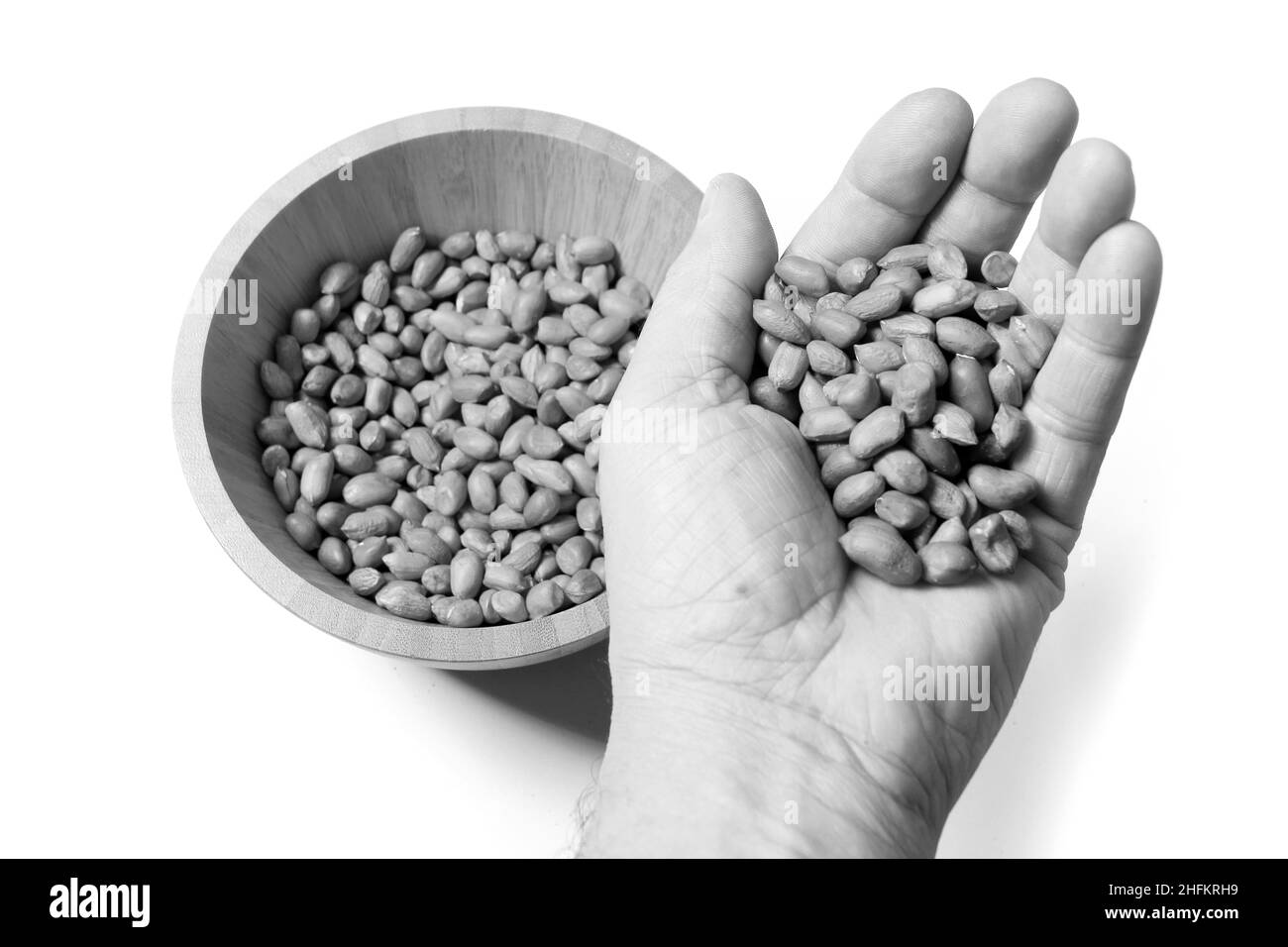 Hand full of nuts Black and White Stock Photos & Images - Alamy