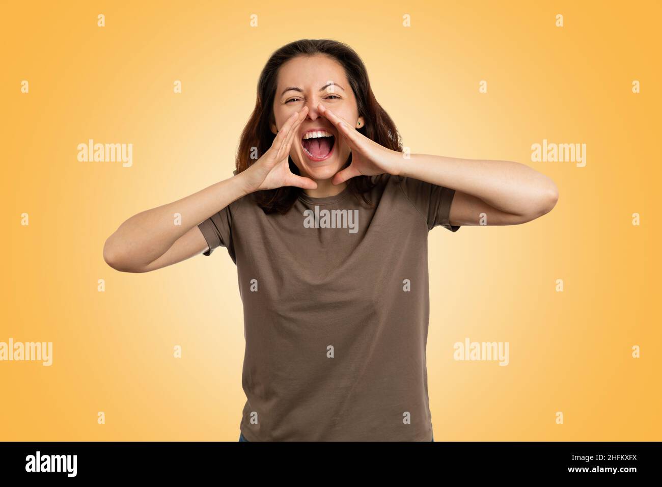 Emotions and expressions. Portrait of young caucasian woman shouting ...