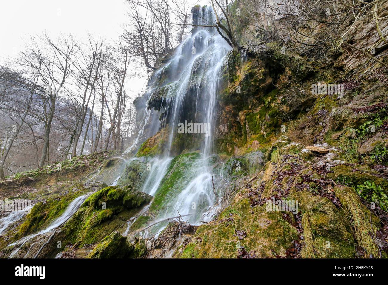 Bad Urach, Germany. 16th Jan, 2022. Water falls into the depths at the ...