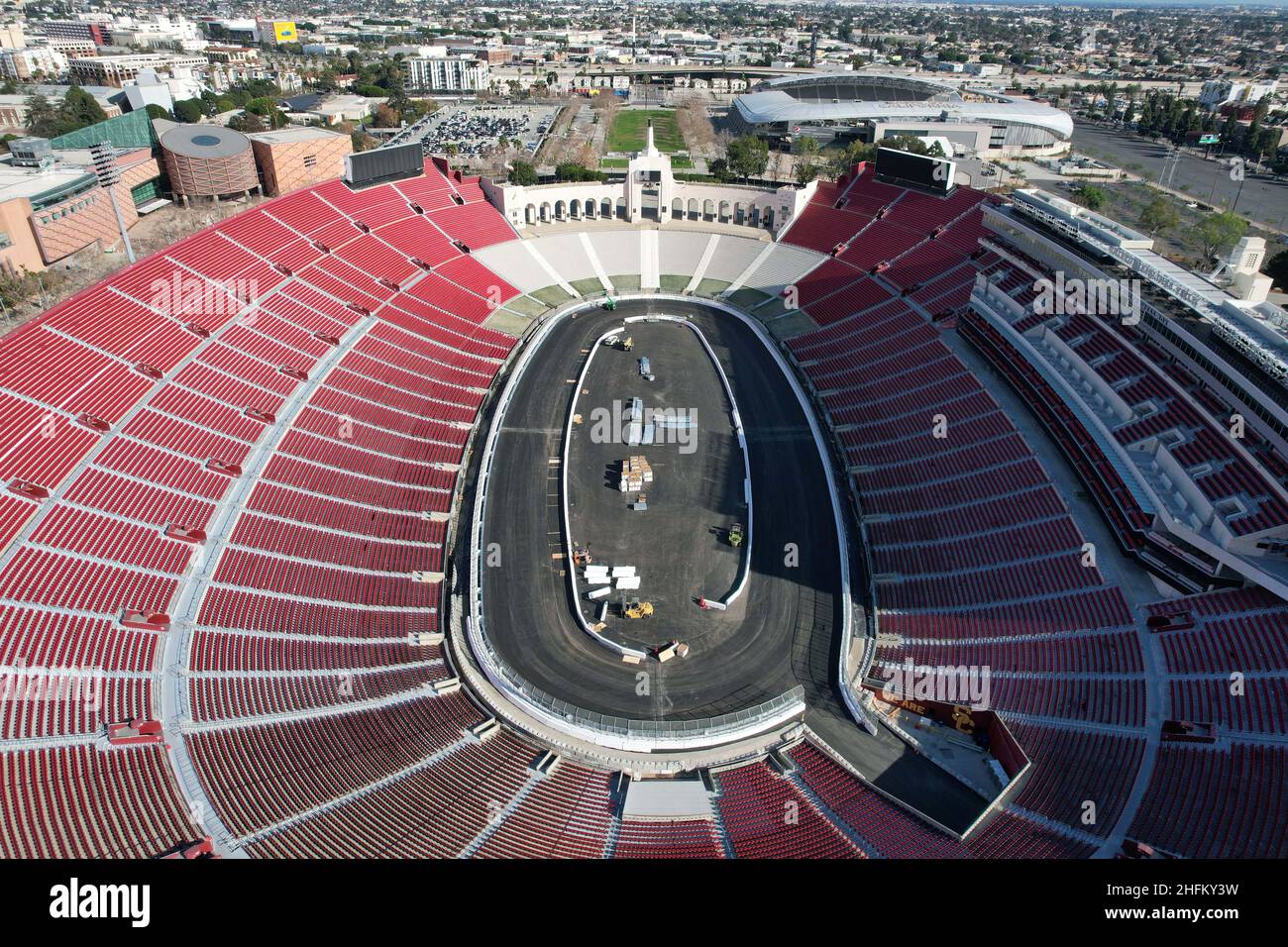 An aerial view of the construction of a temporary asphalt racetrack at the Los Angeles Memorial ...