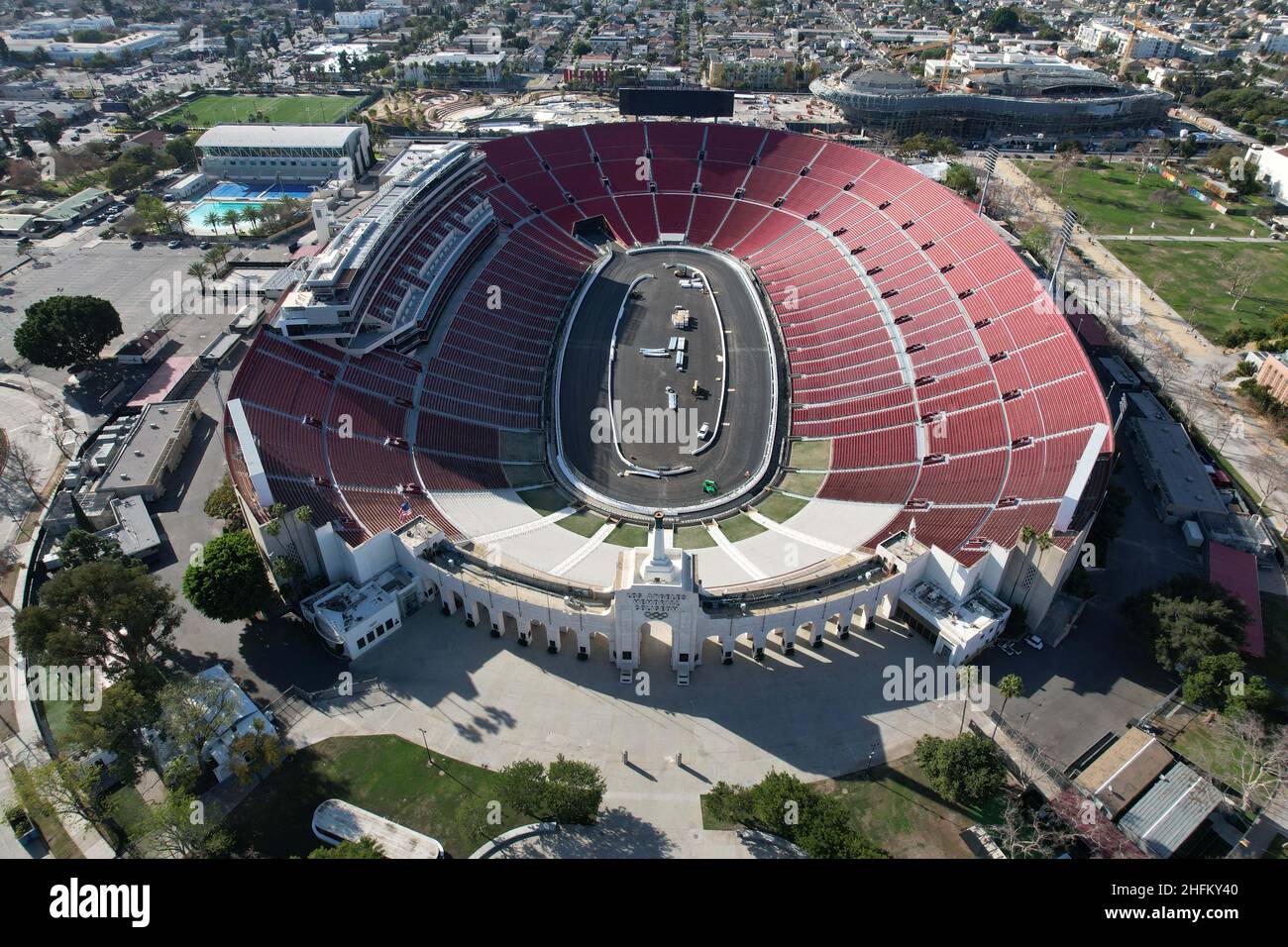 An aerial view of the construction of a temporary asphalt racetrack at the Los Angeles Memorial ...