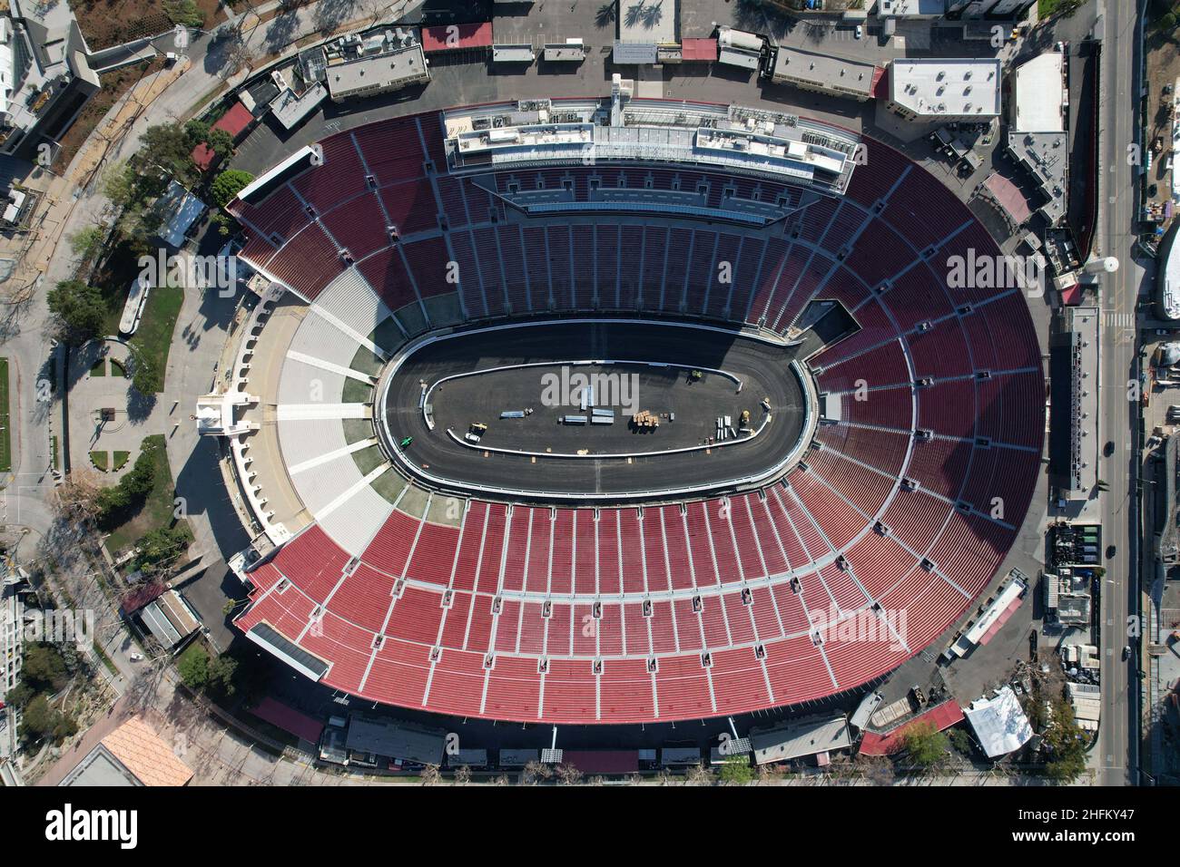 An aerial view of the construction of a temporary asphalt racetrack at the Los Angeles Memorial ...