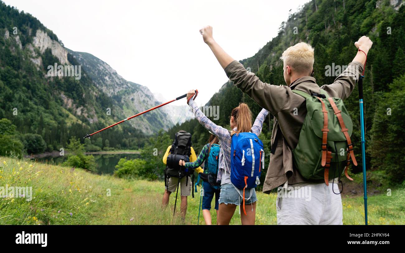 Group of happy friends enjoying outdoor activity together Stock Photo ...