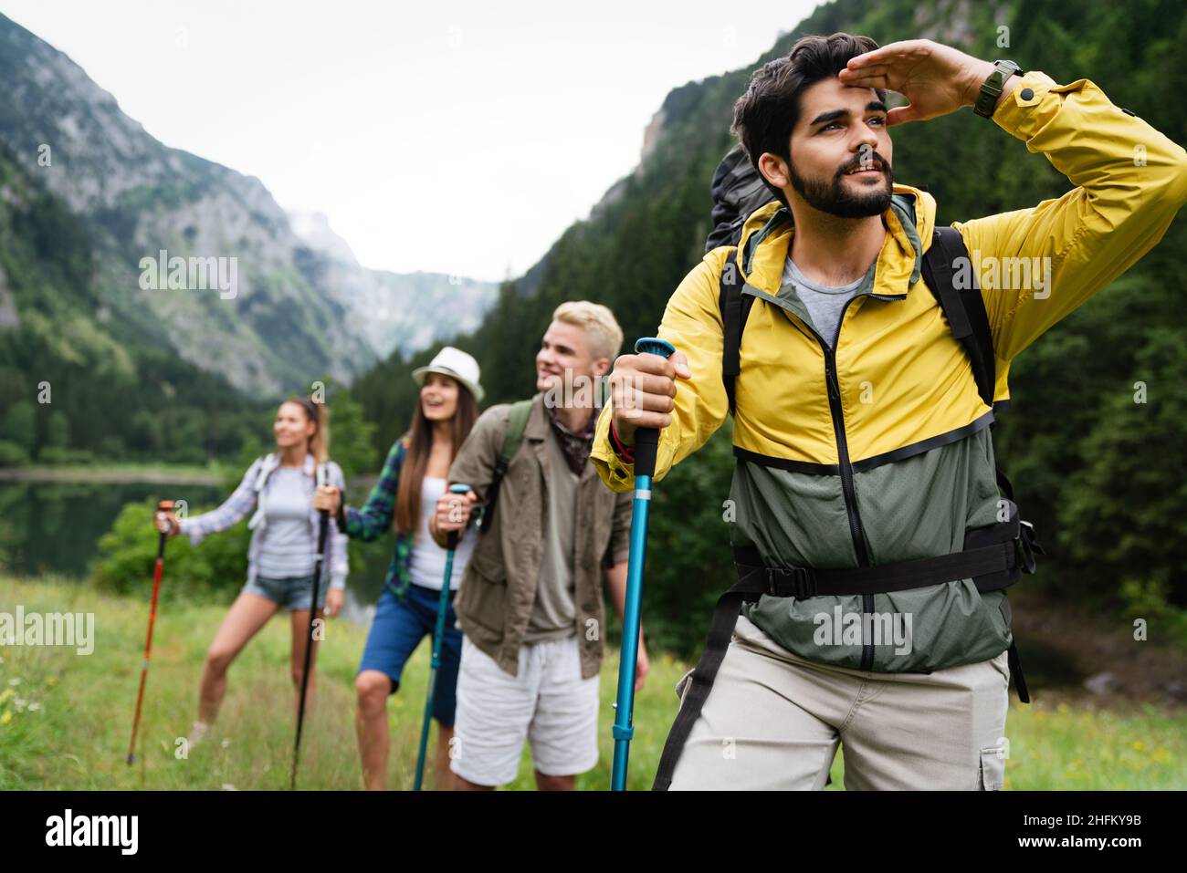 Group of happy friends enjoying outdoor activity together Stock Photo ...