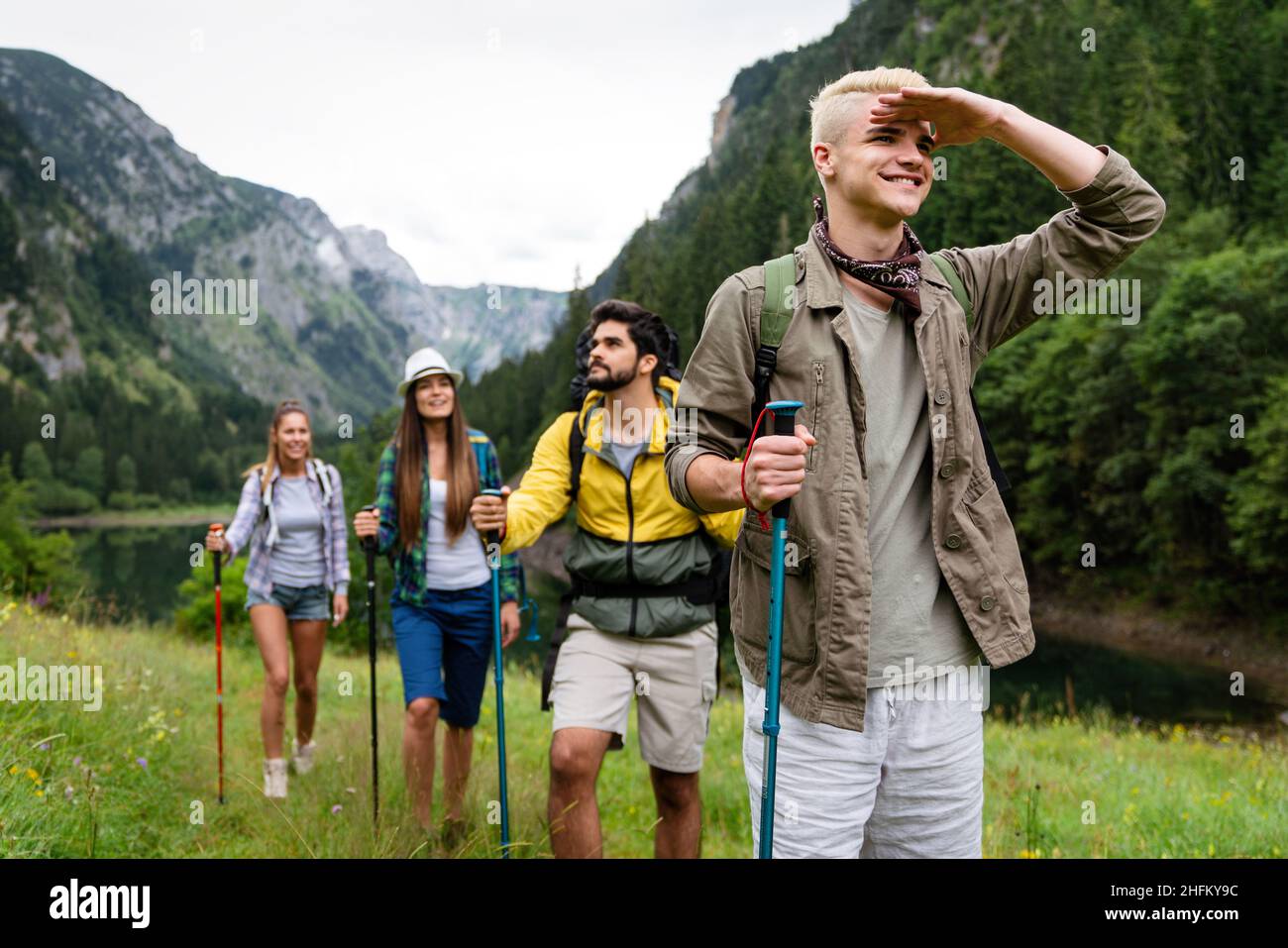 Group of happy friends enjoying outdoor activity together Stock Photo ...