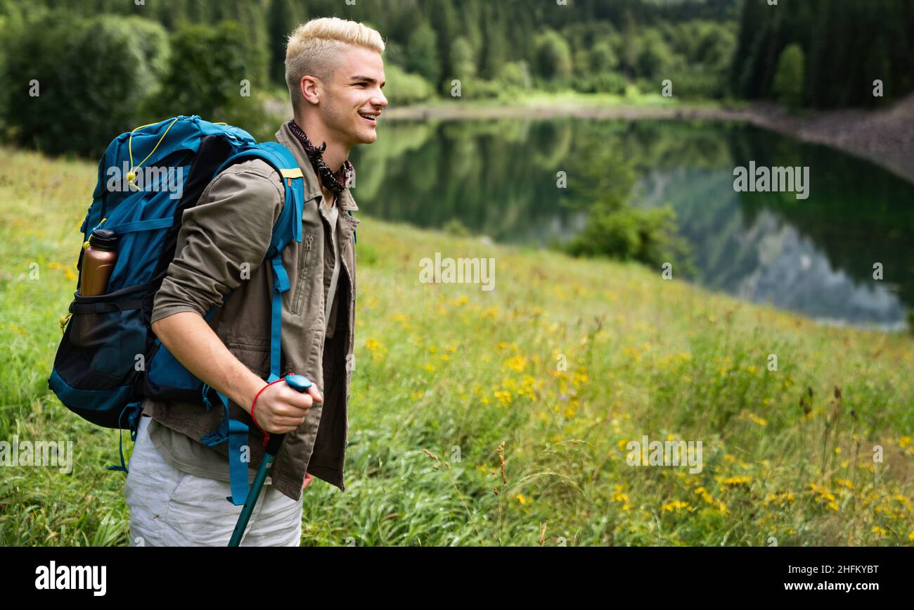 Active healthy man hiking in beautiful nature. Outdoor activity, sport ...