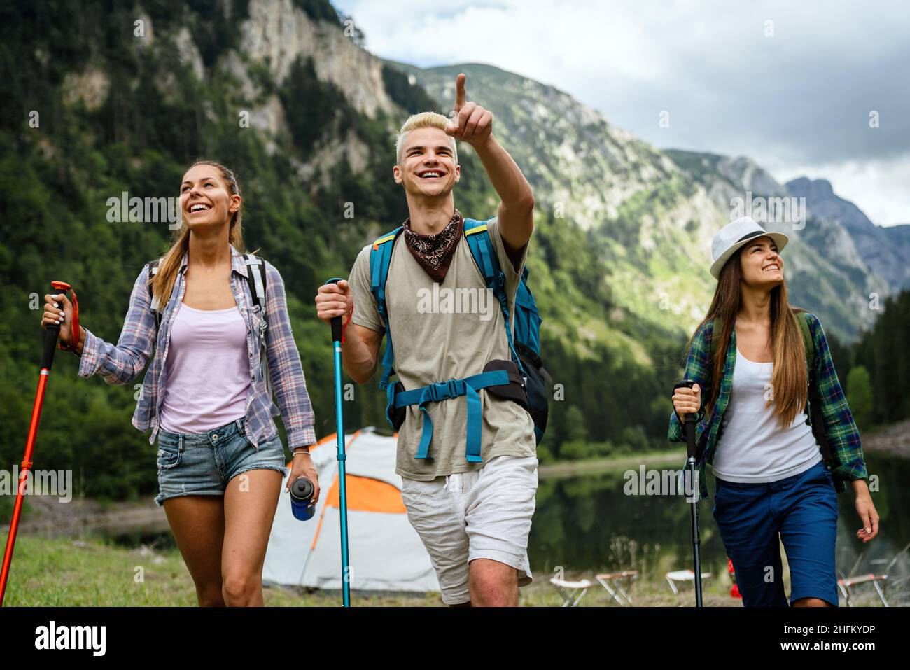 Group of happy hiker friends trekking as part of healthy lifestyle ...
