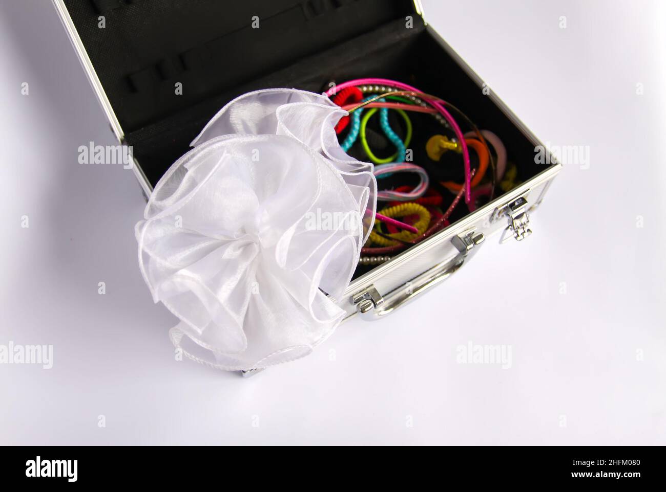 Woman's accessories in box. Hair pins and beads Stock Photo - Alamy