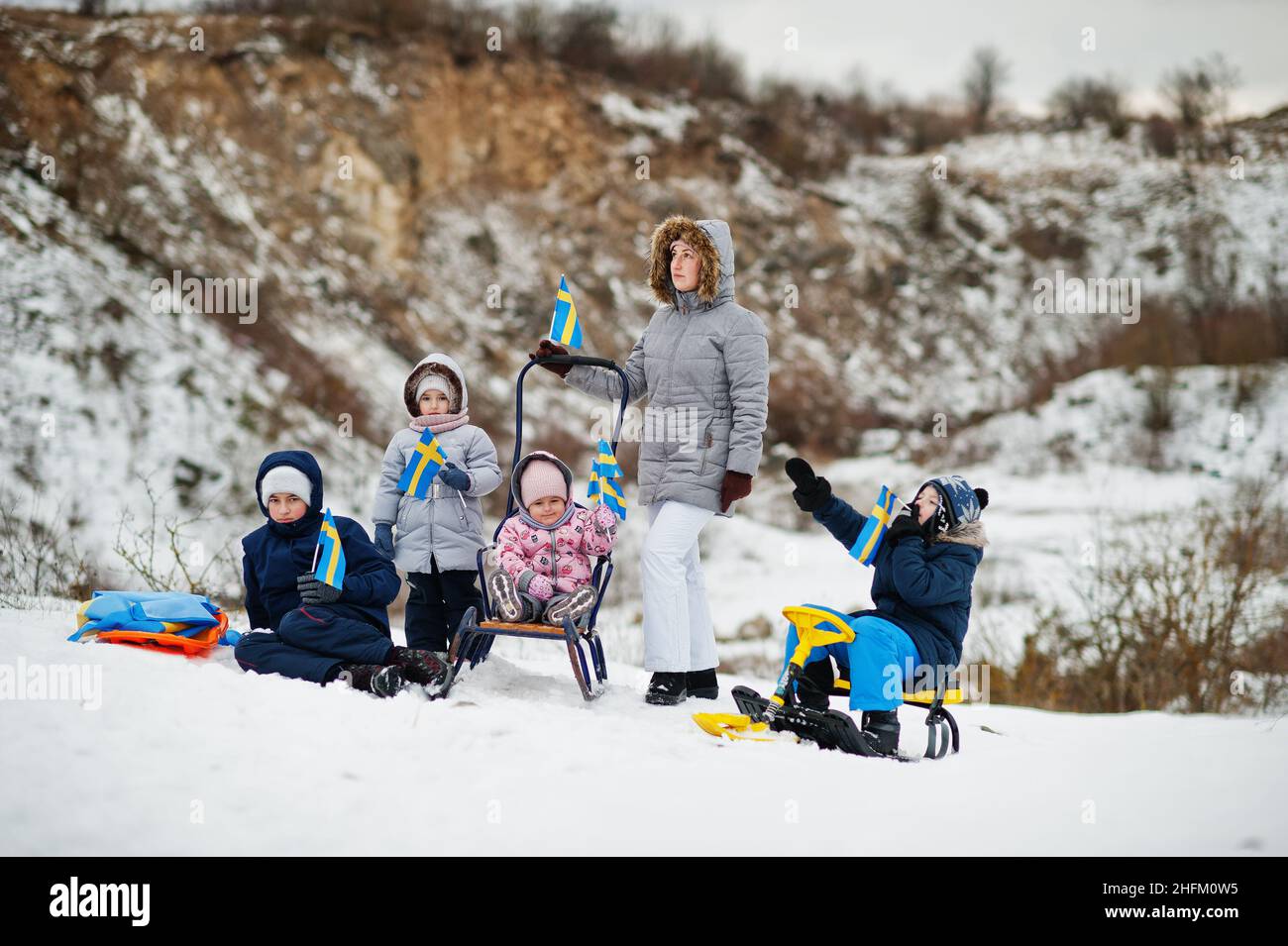 Scandinavian family with Sweden flag in winter swedish landscape Stock ...
