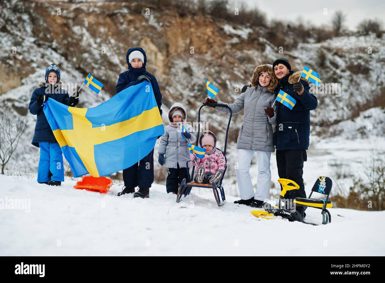 Scandinavian family with Sweden flag in winter swedish landscape Stock ...