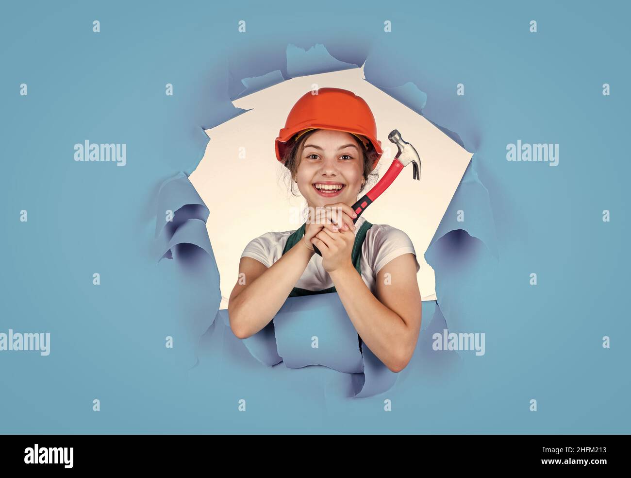 happy kid engineer with hammer tool in hard hat, industry Stock Photo ...