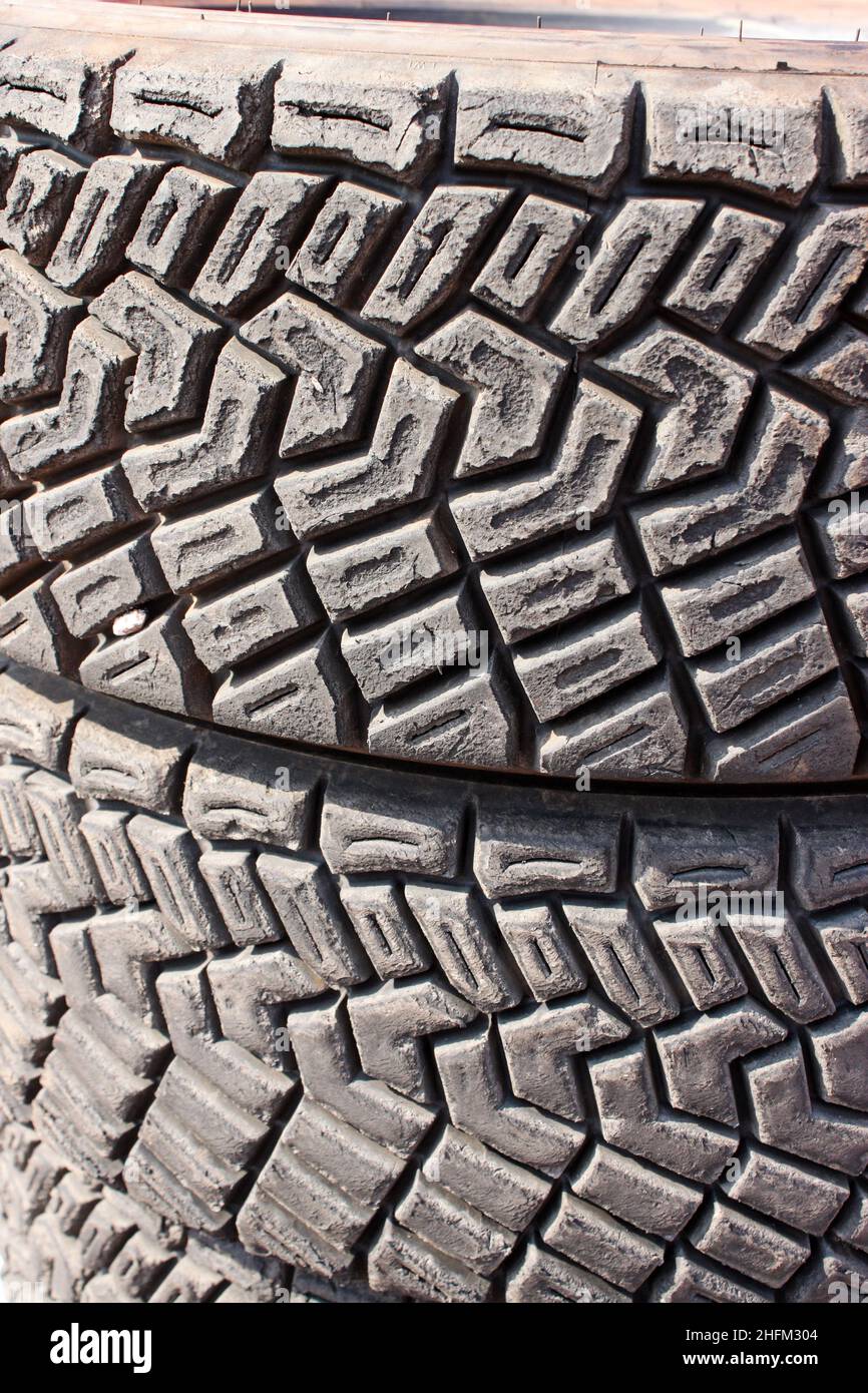 The detail of the tread of two gravel tyres used for rally racing cars ...
