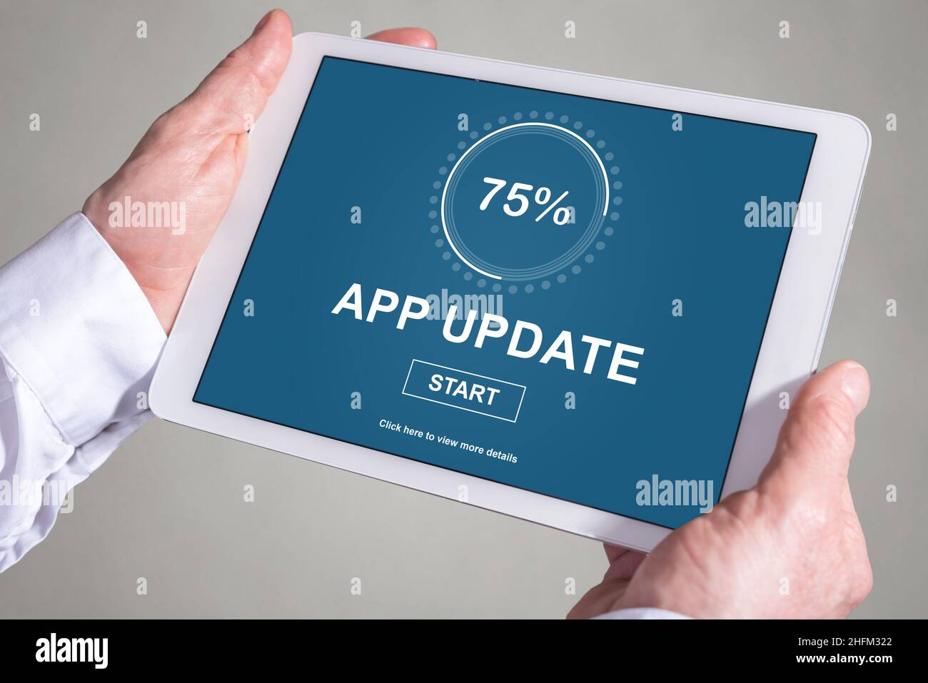 Tablet screen displaying an application update concept Stock Photo - Alamy