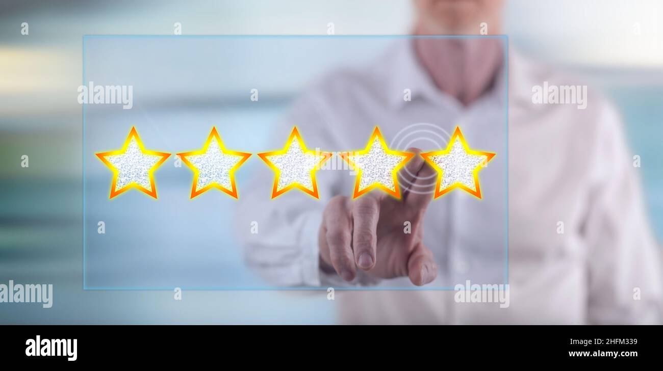 Man touching a quality concept on a touch screen with his finger Stock ...