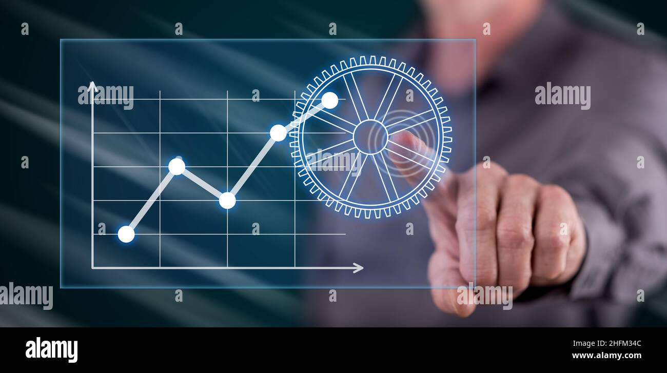 Man touching a digital business analysis concept on a touch screen with ...