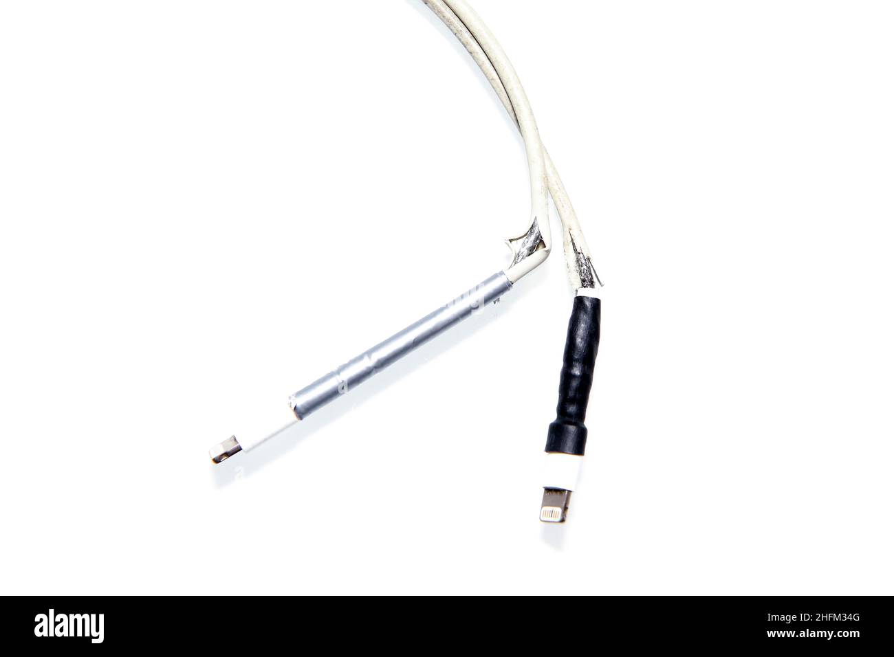 The detail of smart phones charger with broken and frayed cable ...