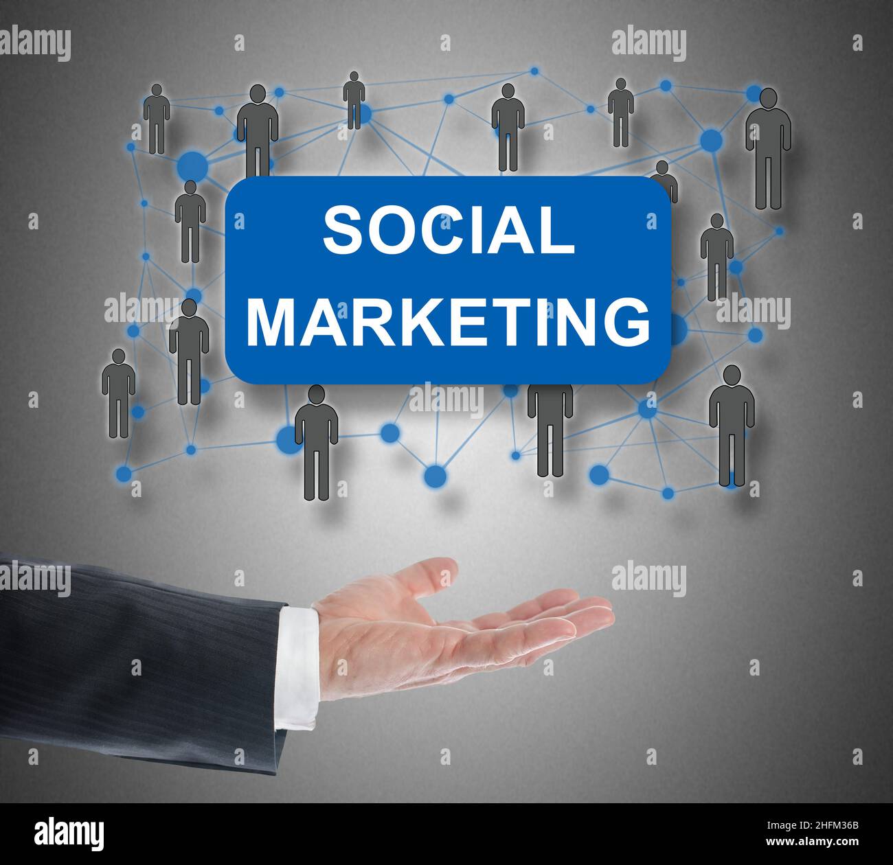 Social marketing concept levitating above a hand on grey background ...