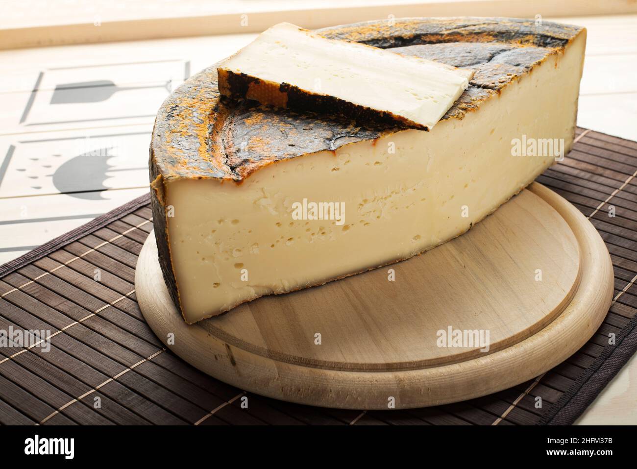 Occelli Barolo Cheese loaf and slice on top Stock Photo - Alamy