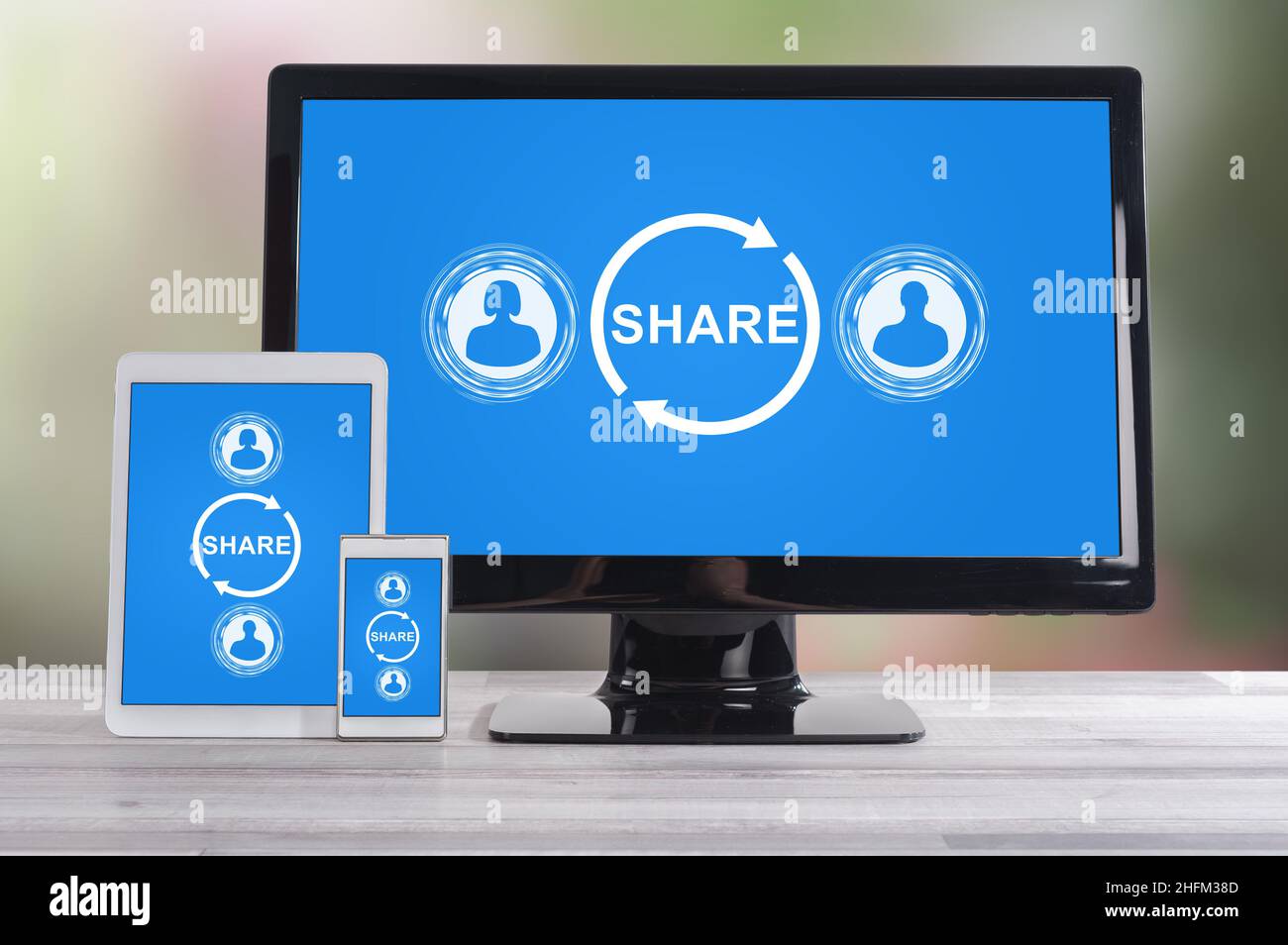 Share concept shown on different information technology devices Stock ...