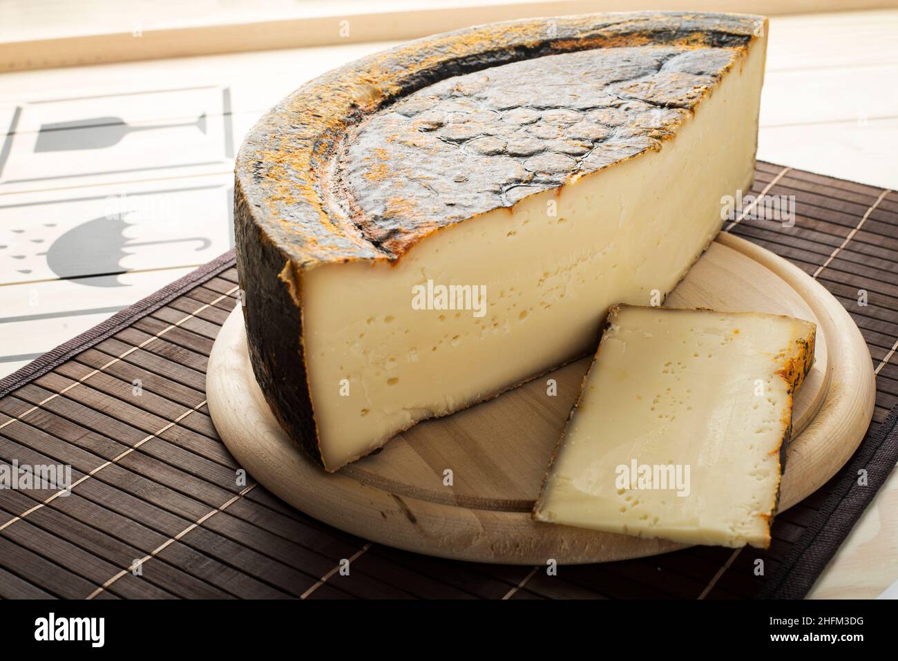 Cut out cheese wheel hi-res stock photography and images - Alamy