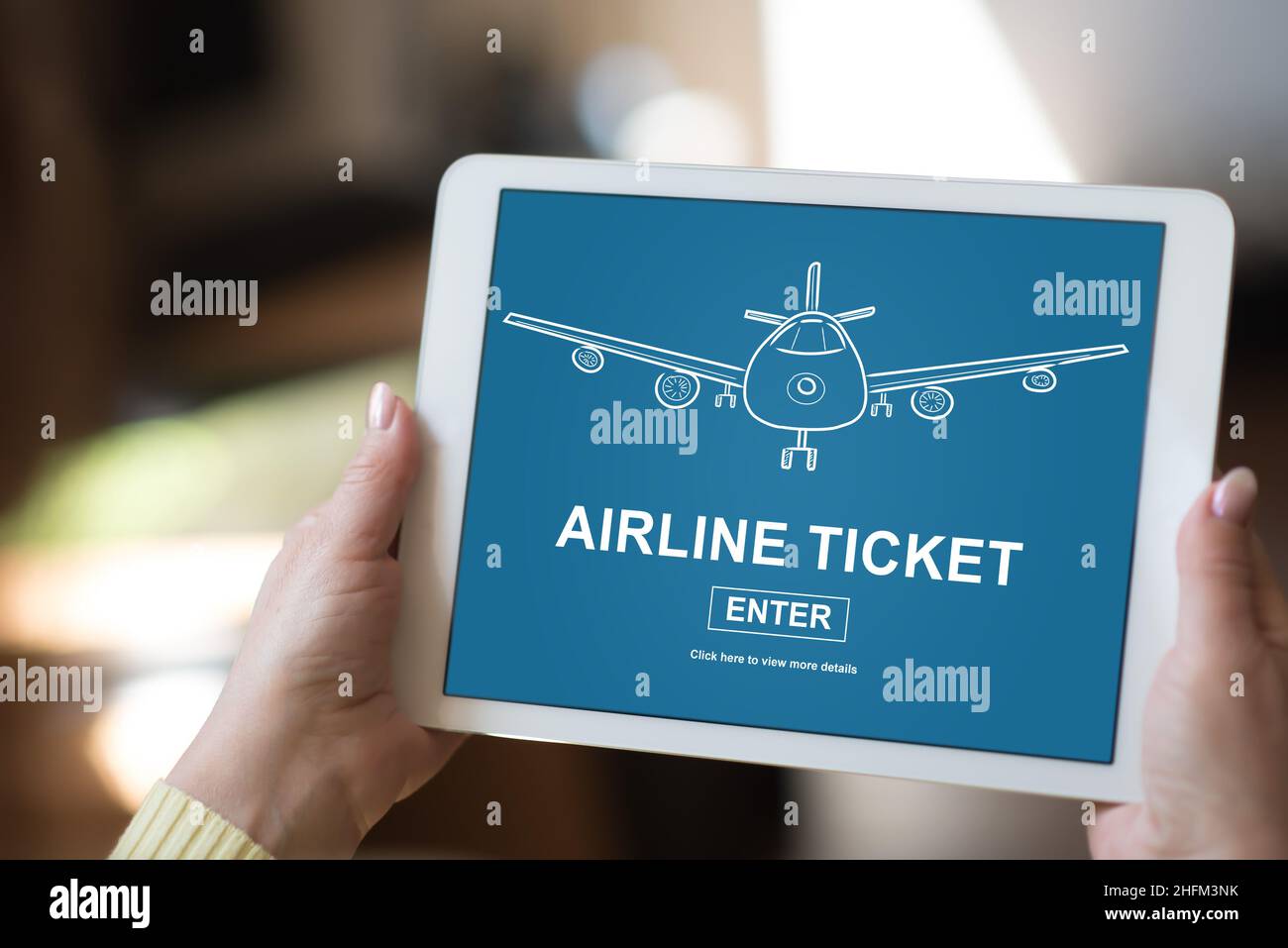 Tablet screen displaying an airline ticket concept Stock Photo - Alamy