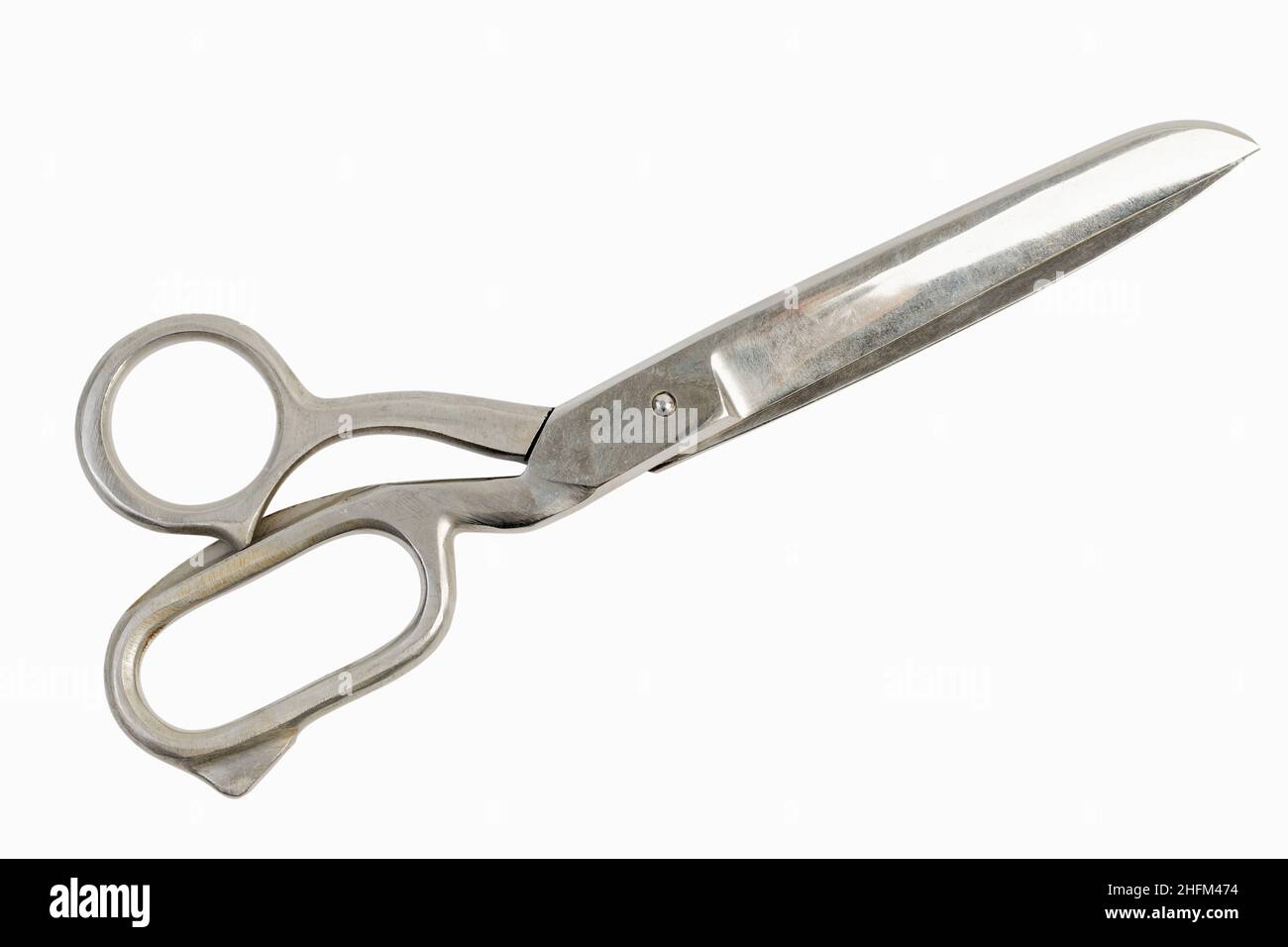 Old stainless steel scissors isolated on white background. Top view ...