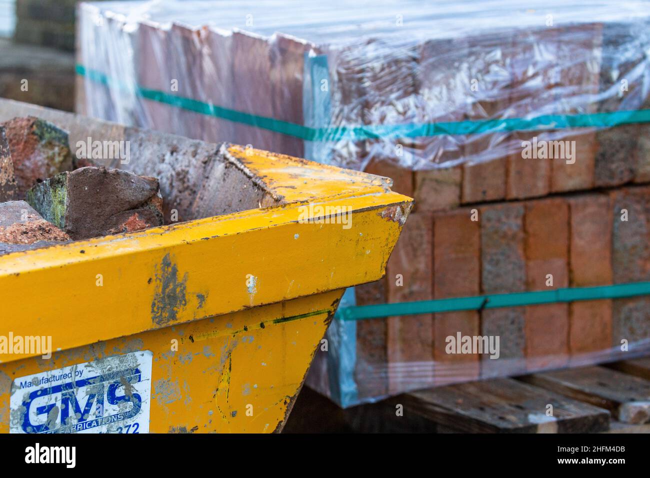 A delivery of building bricks on a wooden pallet. They have been placed ...