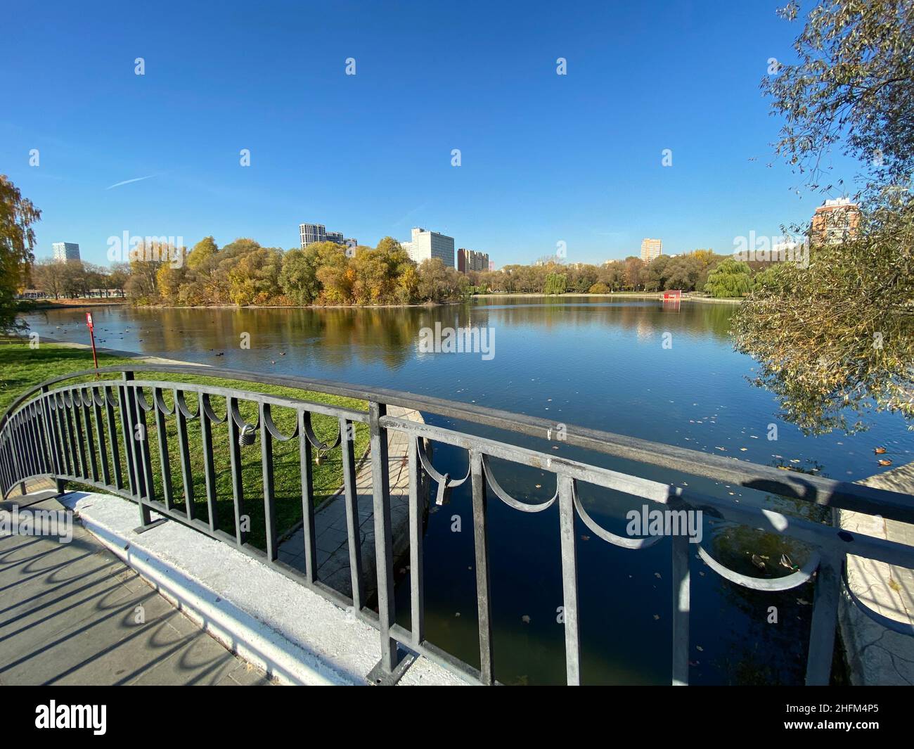 bridge over pond in park at dry sunny autumn day Stock Photo - Alamy