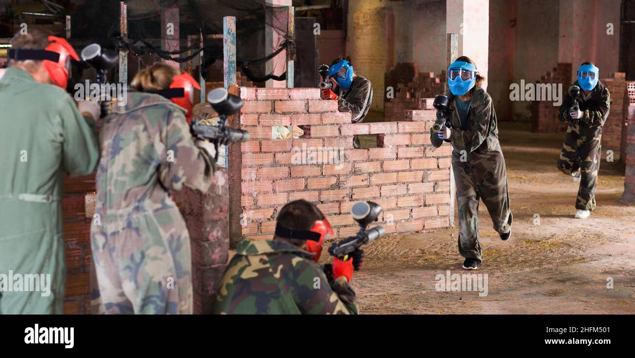 Players of red and blue team faced on the battlefield Stock Photo - Alamy