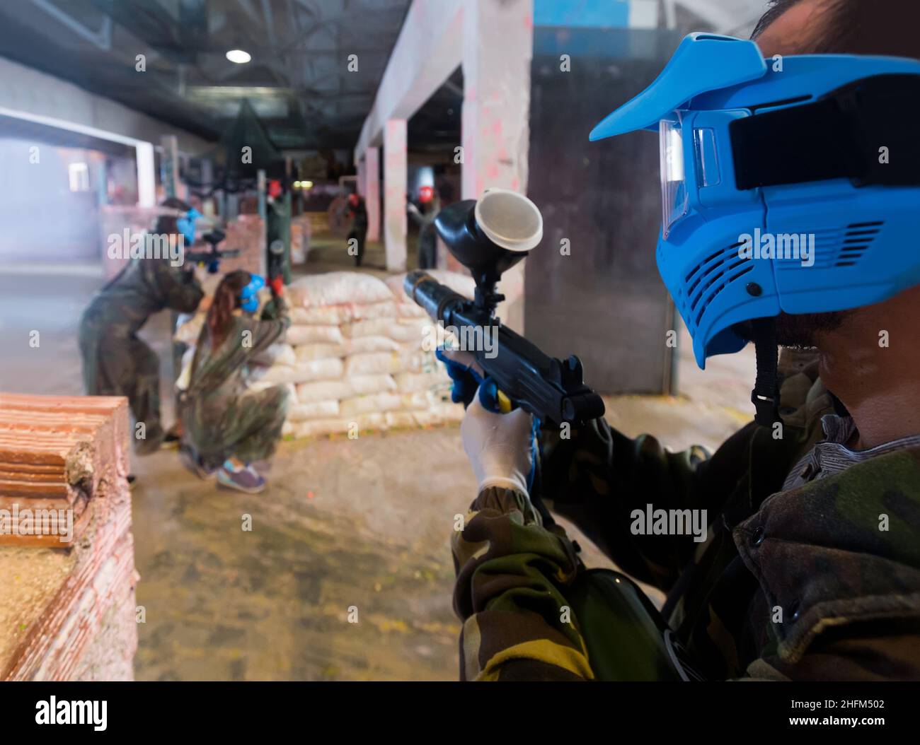Players are targeting in opponents from cover in battlefield Stock ...
