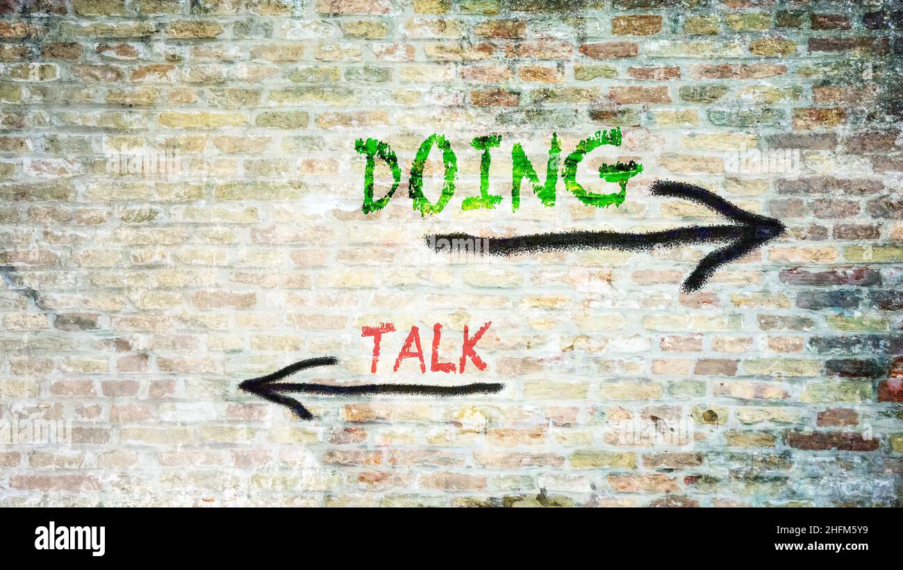 Street Sign the Direction Way to Doing versus Talk Stock Photo - Alamy