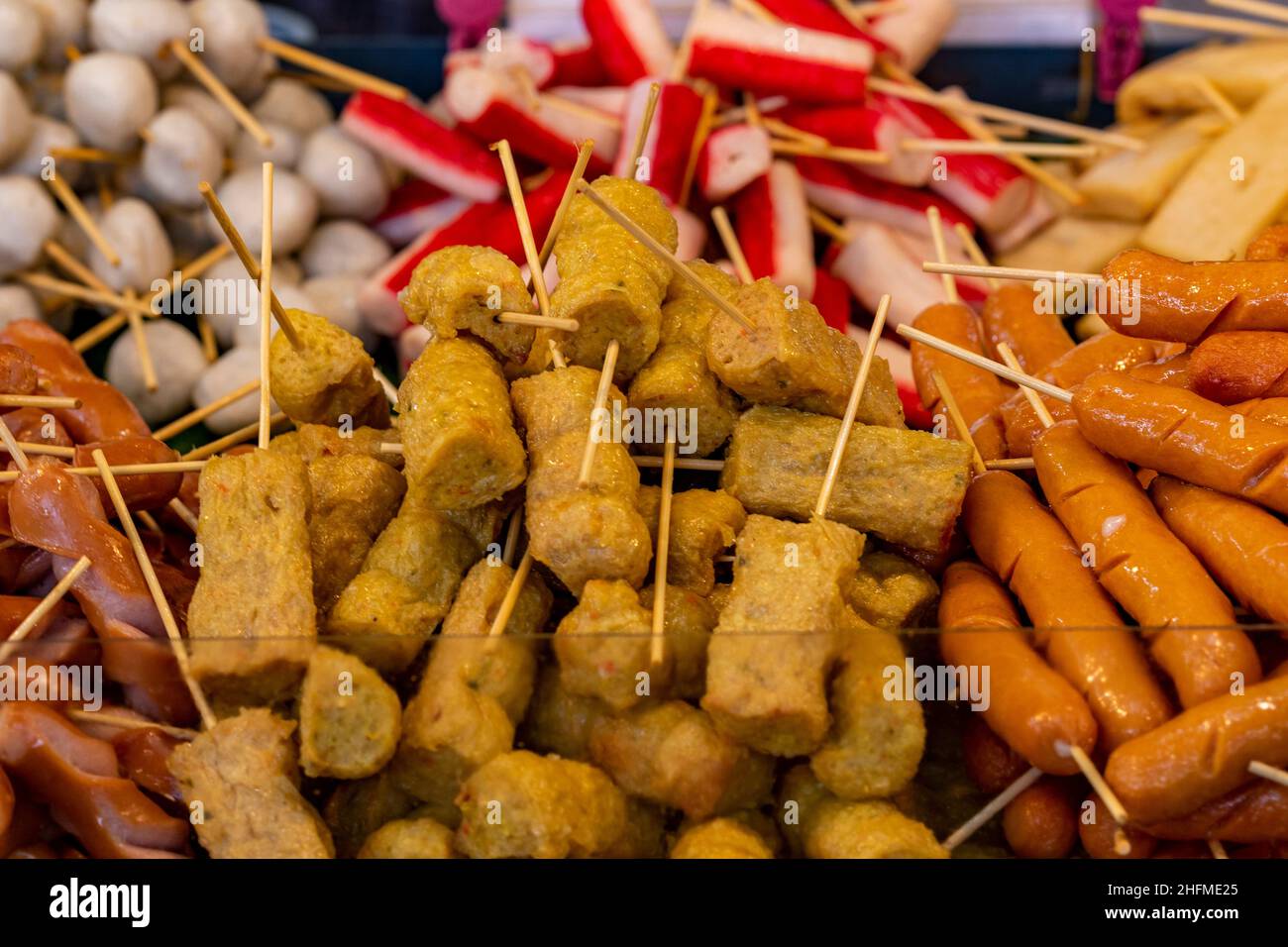 selection of thai foods on display at a food market on the islenad of ...