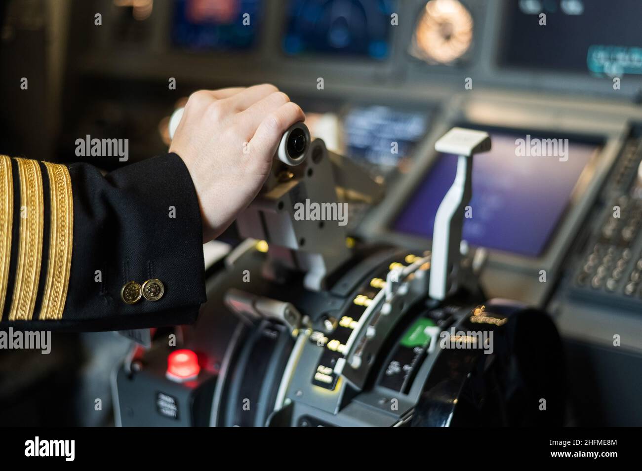 Female pilot's hand on the plane engine control stick Stock Photo - Alamy