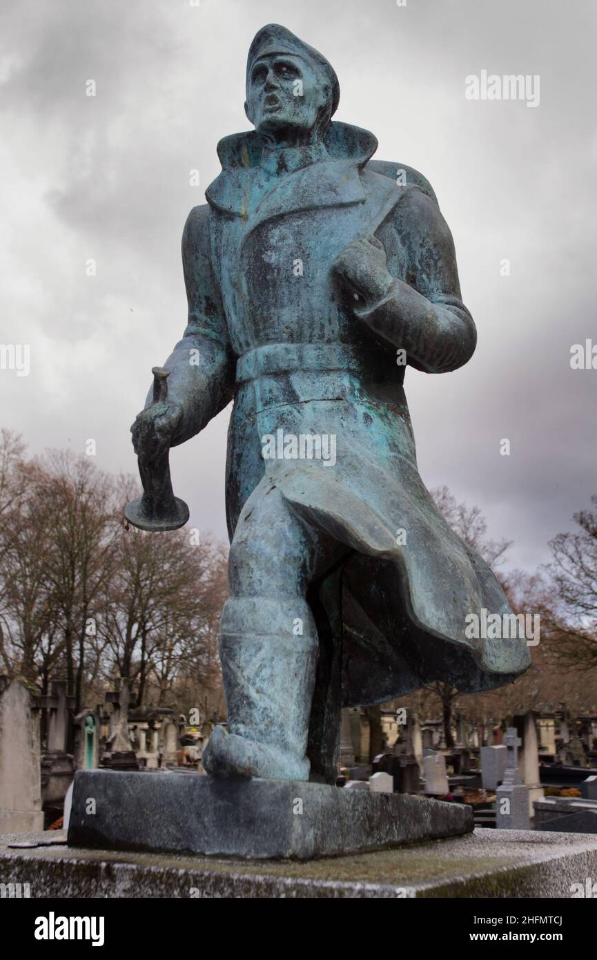 An uniformed Nicolai Roussev striding and carrying a bugle ...