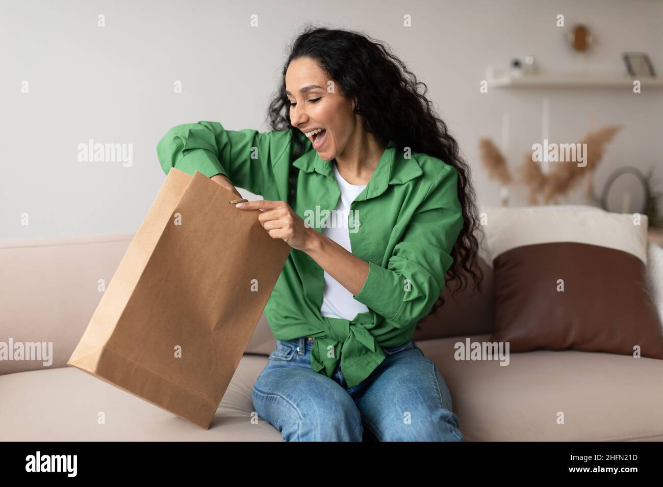 Unpacking the package hi-res stock photography and images - Alamy