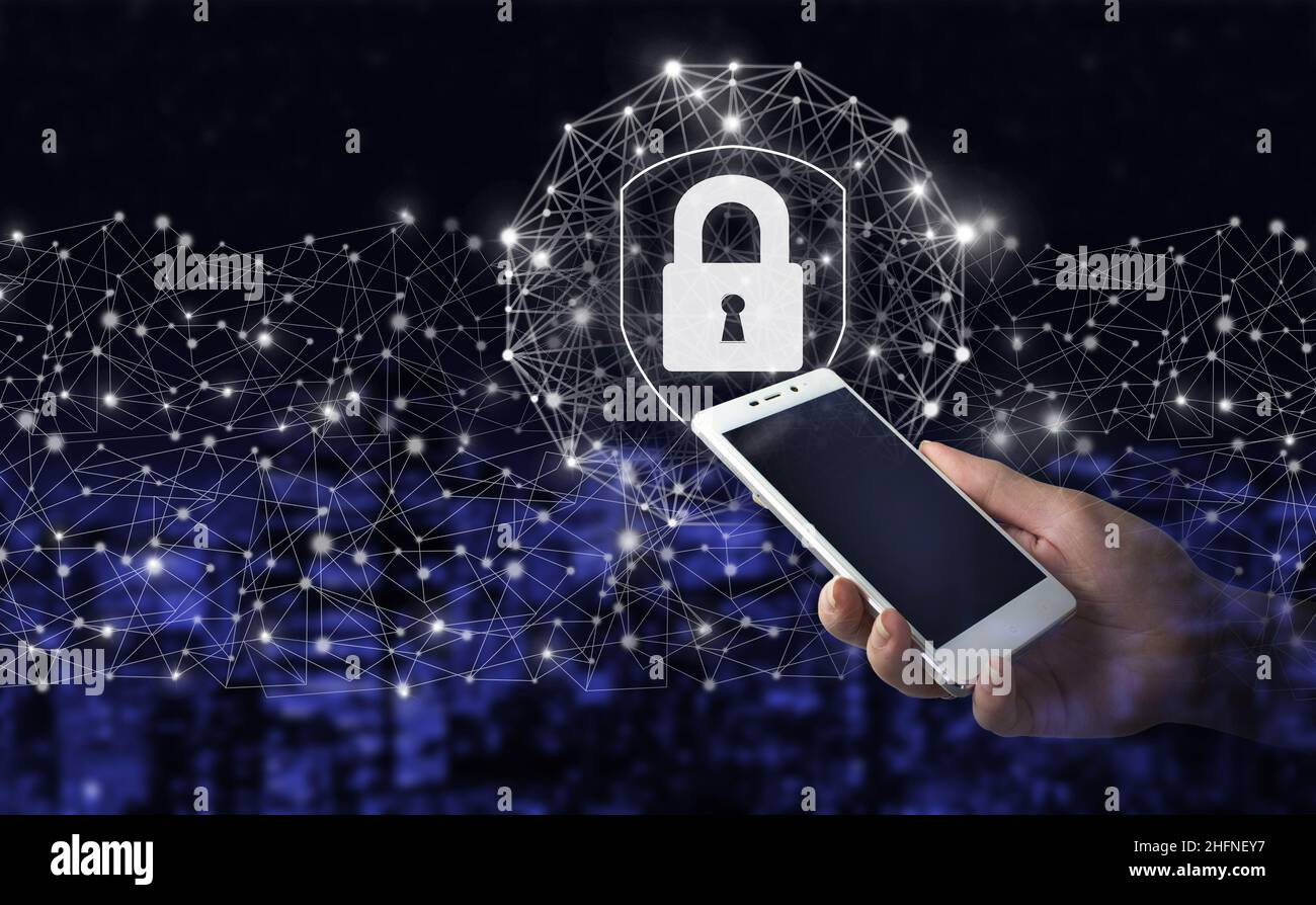 Data protection from hacker.GDPR. Hand hold white smartphone with ...