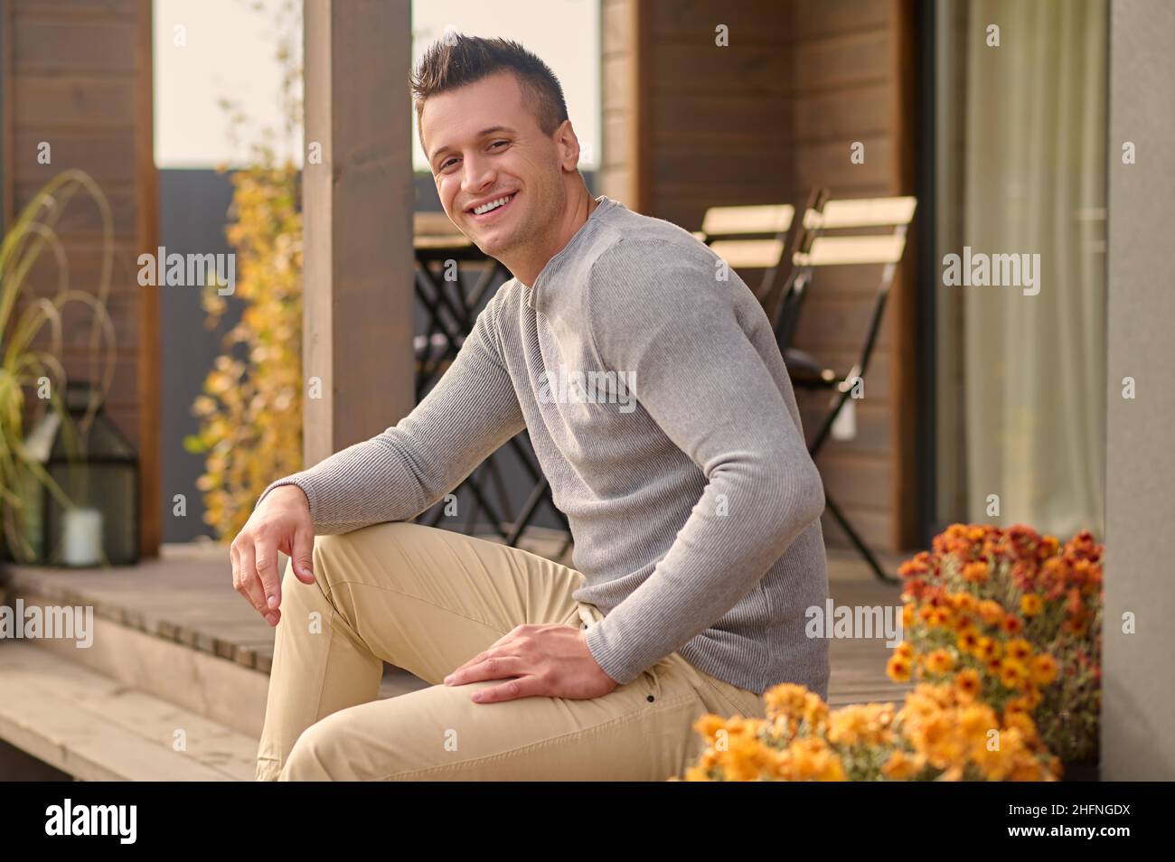 Man sitting on porch hi-res stock photography and images - Alamy