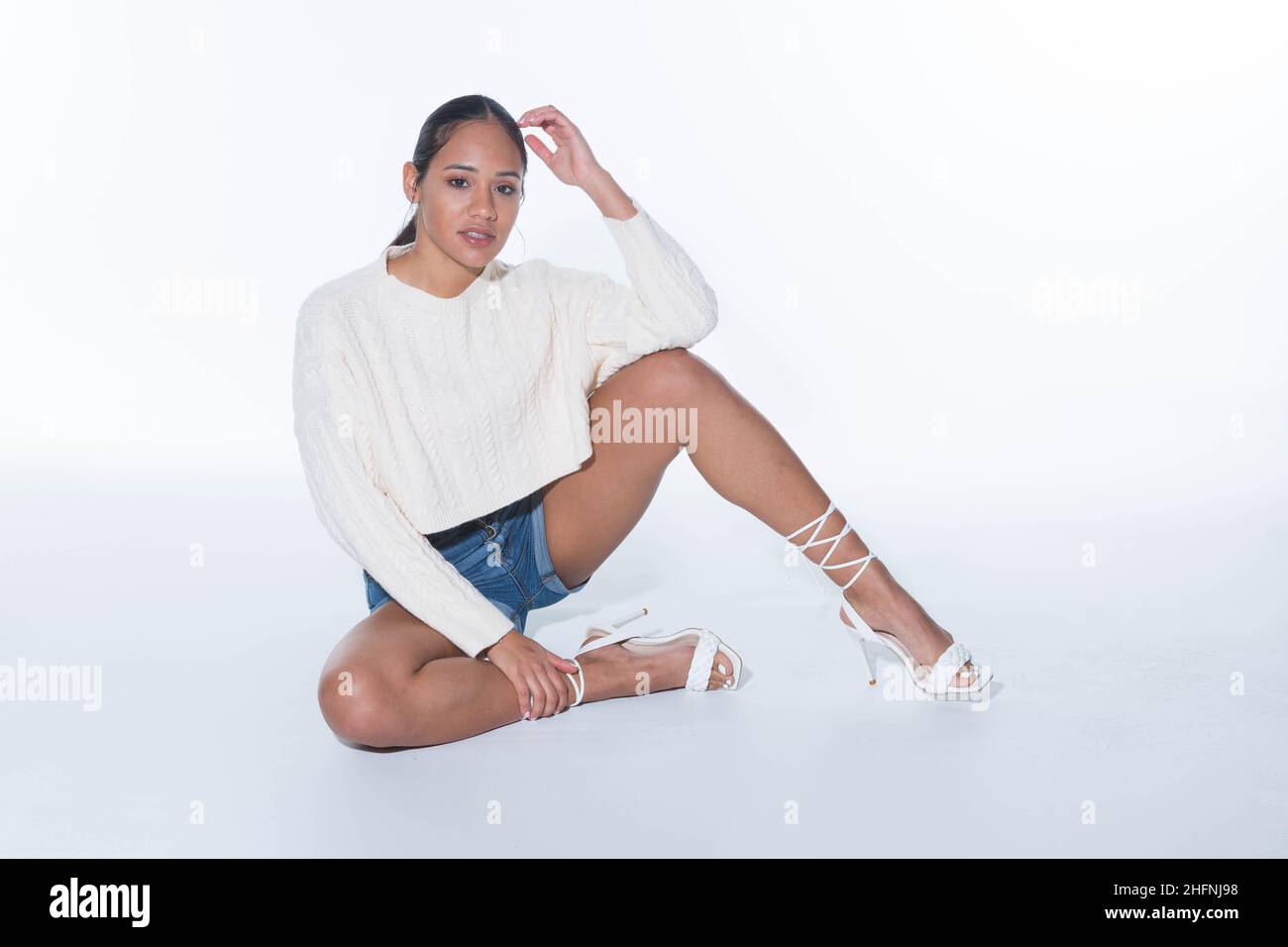 photo of young model in studio on plain background Stock Photo - Alamy