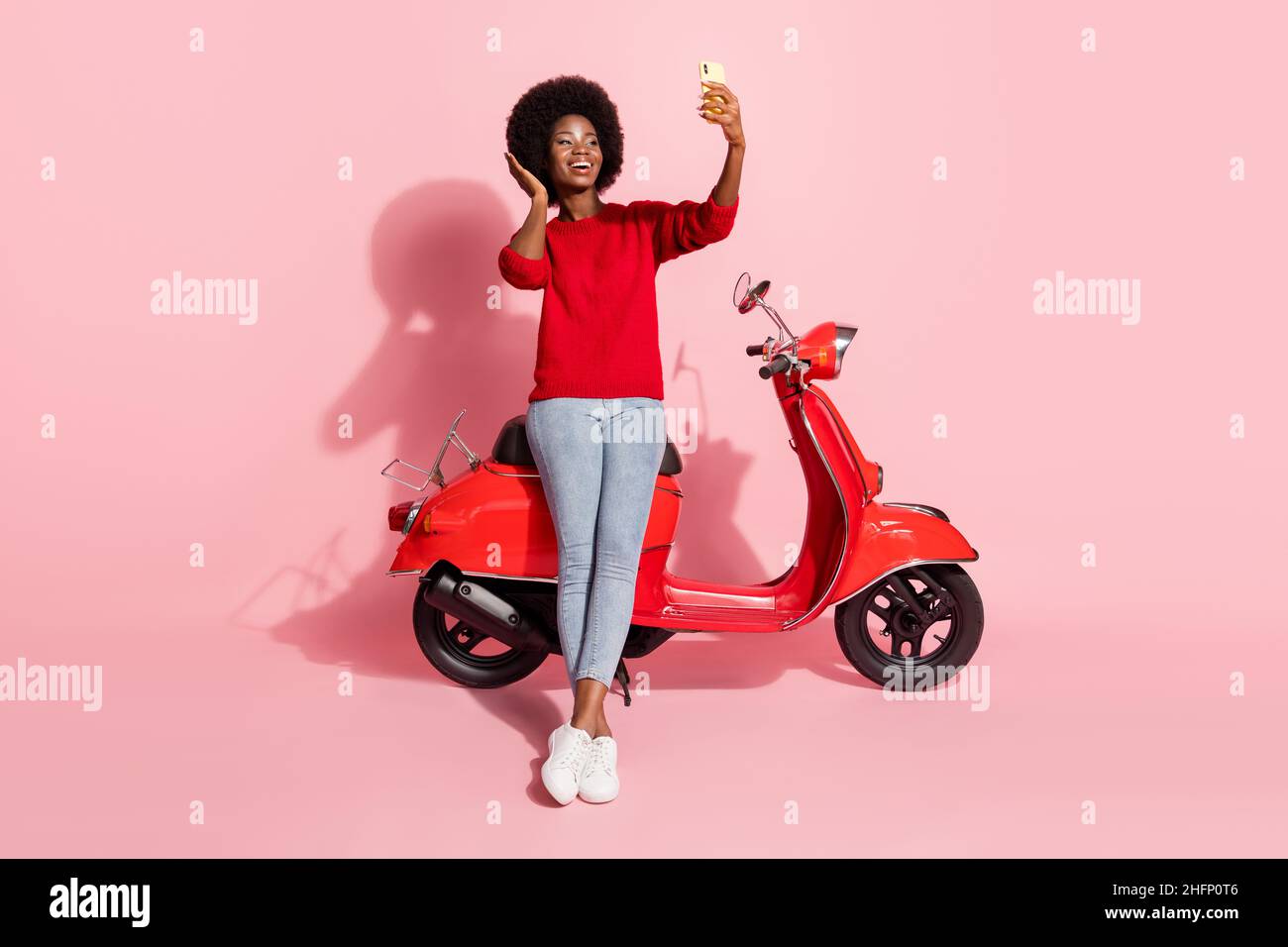 Full body portrait of cheerful dark skin lady hand touch hair make ...