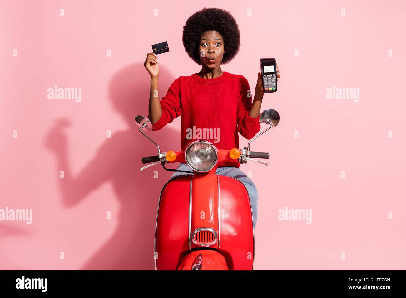 Photo of impressed attractive dark skin lady hold debit card pos ...