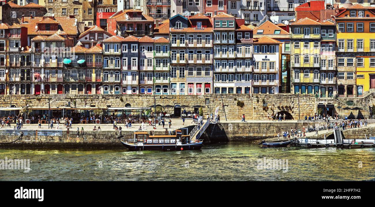 Portugal. Porto. Typical colorful facades of buildings Estiva Quay ...