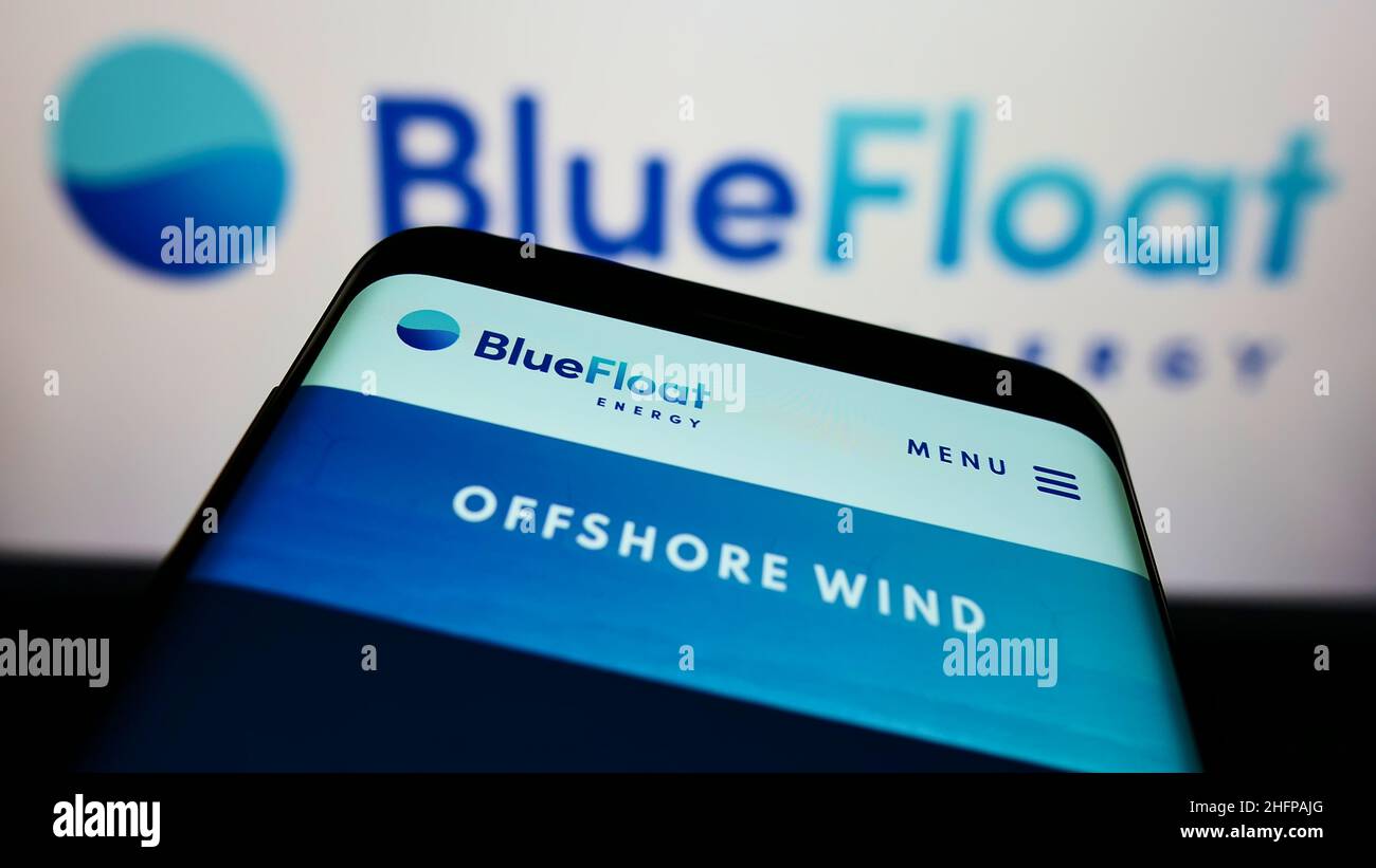 Mobile phone with webpage of Spanish renewables company BlueFloat ...