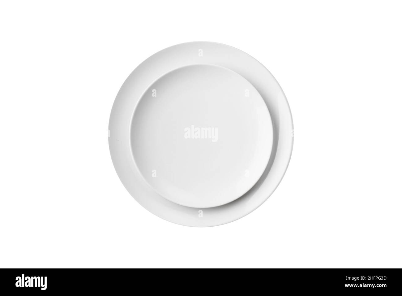 Two white plates of different sizes isolated on white background. Top ...