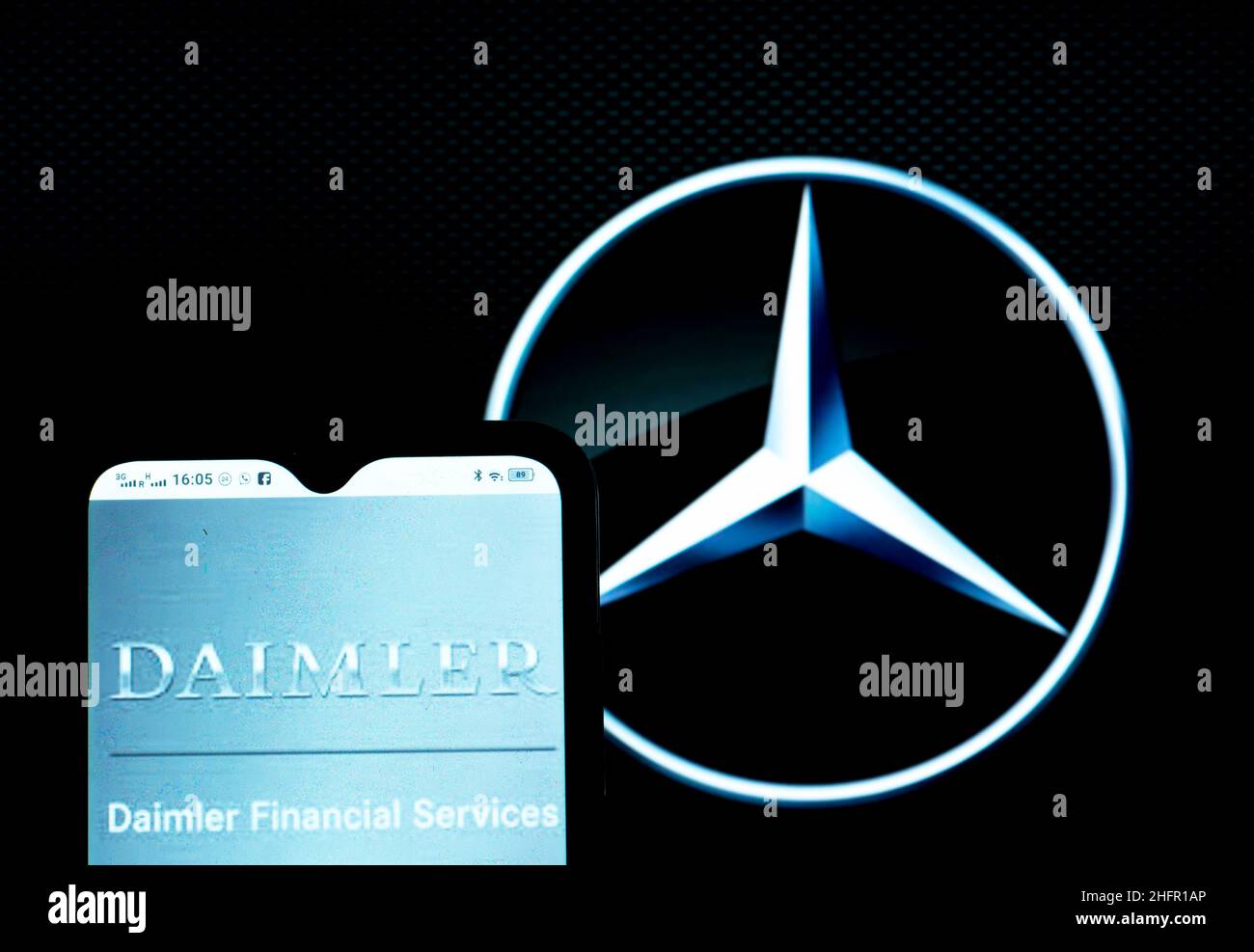In this photo illustration, the Daimler Financial Services logo is seen ...
