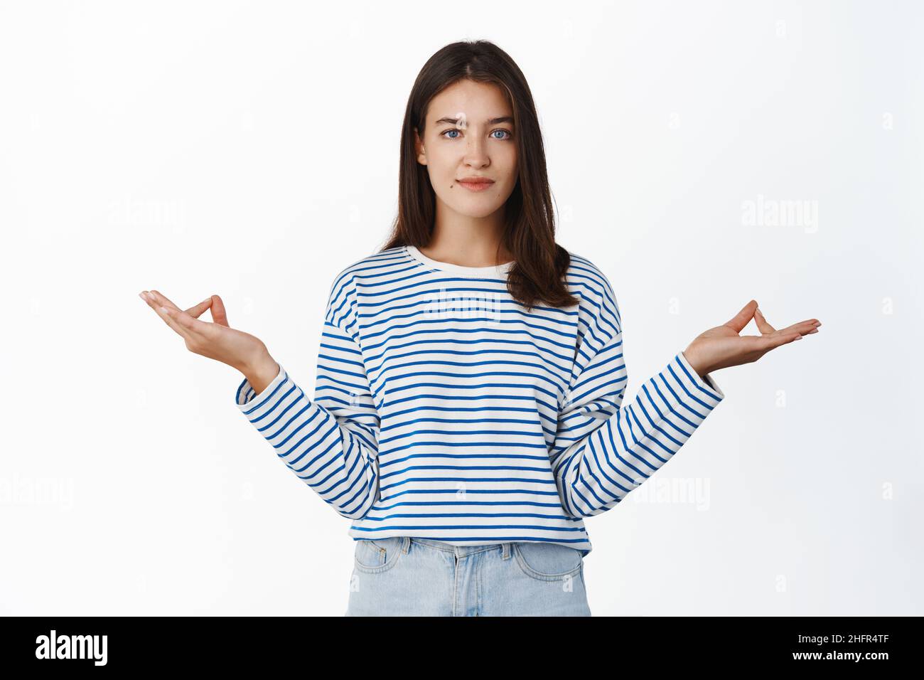 Mindfulness and zen. Relaxed young woman meditating, feeling peace and ...