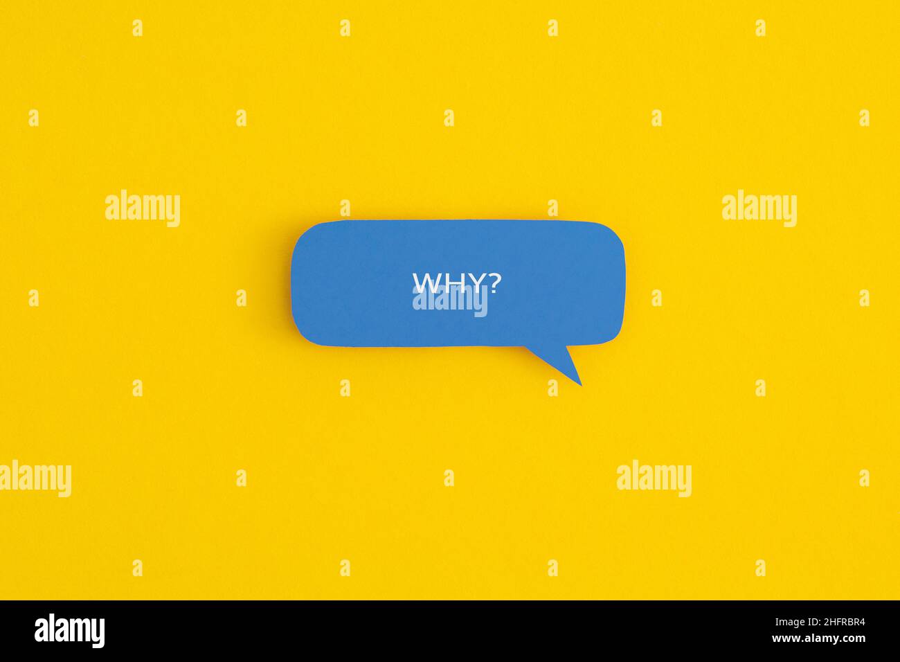 Paper speech bubble with the word "Why" on a yellow background. Top ...