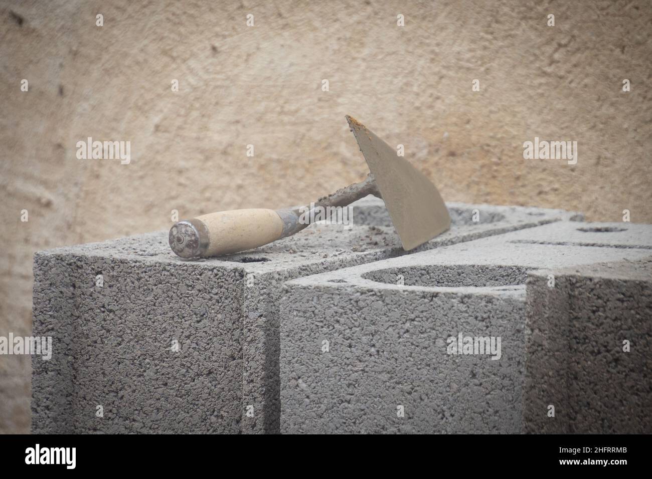 superimposed cinder block for a house construction Stock Photo - Alamy