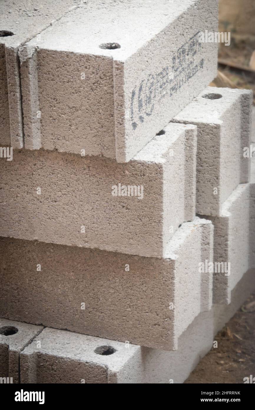 superimposed cinder block for a house construction Stock Photo - Alamy